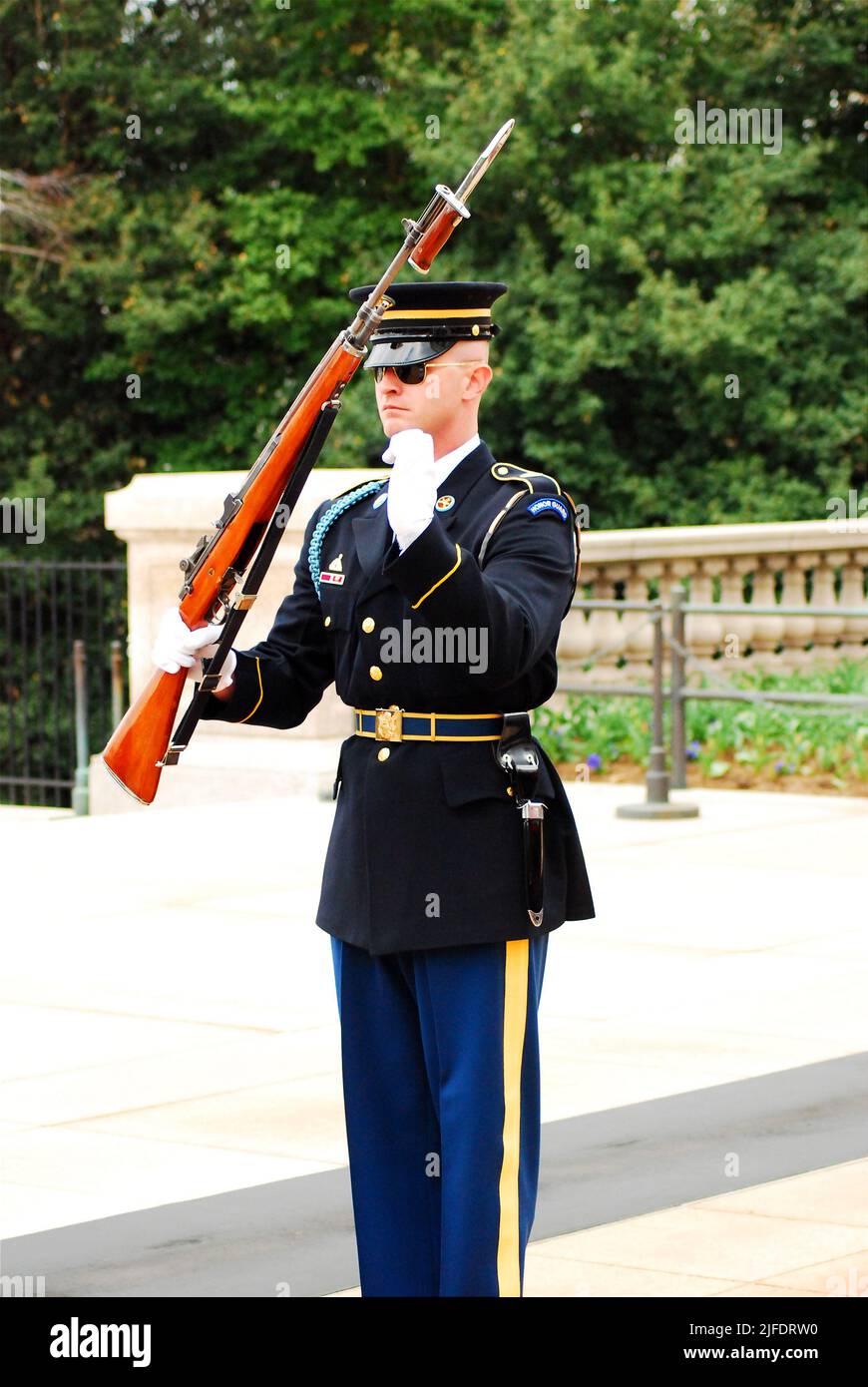 An honor guard participates in the Changing of the Guard ceremony, a ...