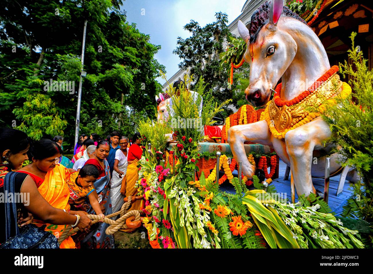 Habibpur, India. 01st July, 2022. A little child touches the Chariot of ...