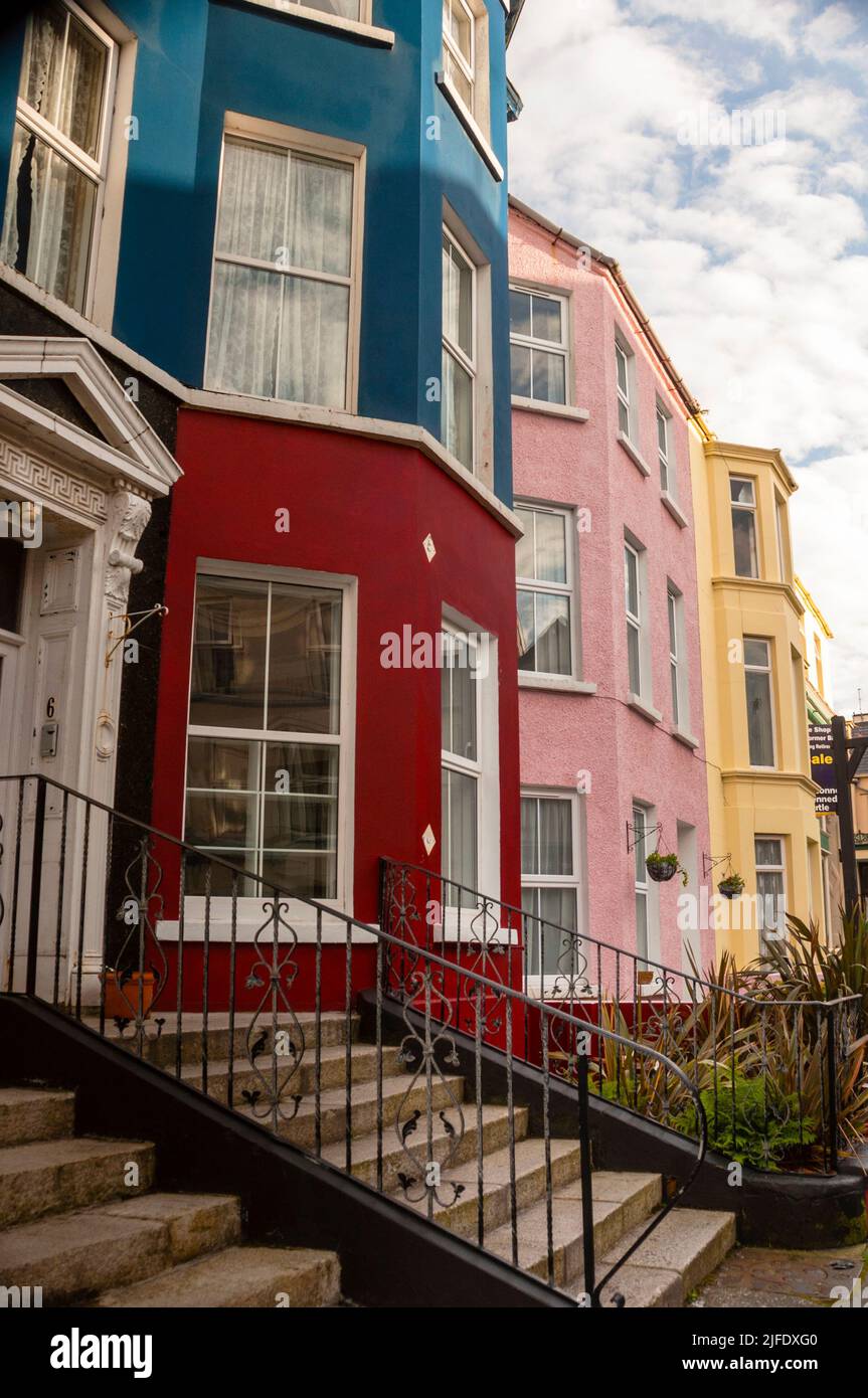 Georgian style triangle door pediment and Victorian style bay windows ...