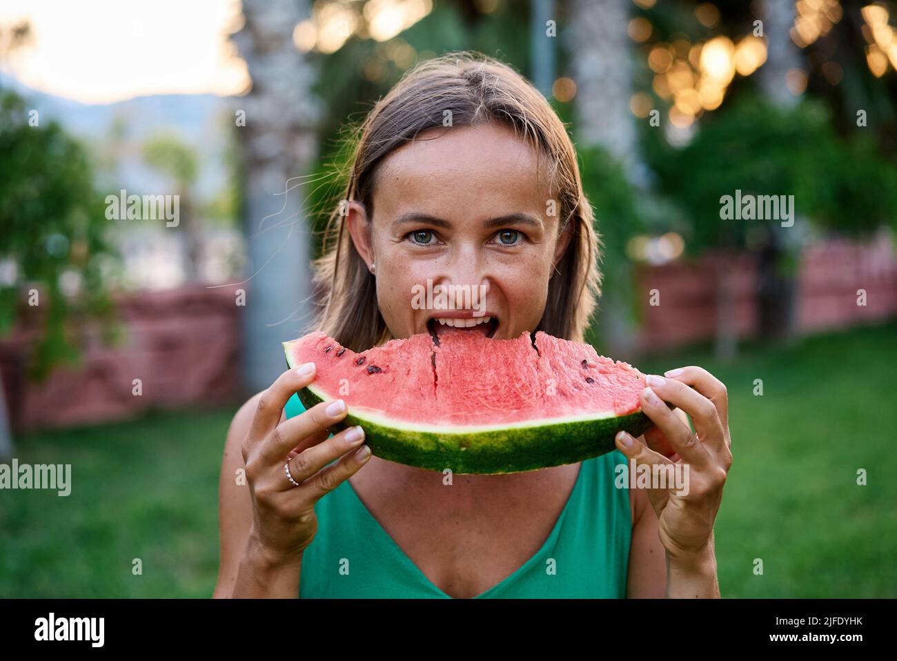 Biting into a melon hi-res stock photography and images - Alamy