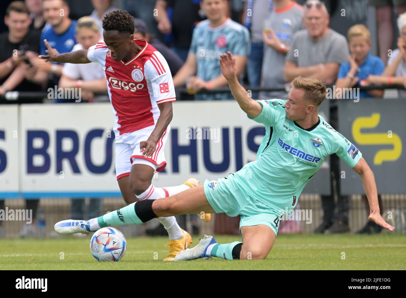 OLDENZAAL - (lr) Jaydon Banel of Ajax, Jasper van der Werff of SC Paderborn during the friendly ...
