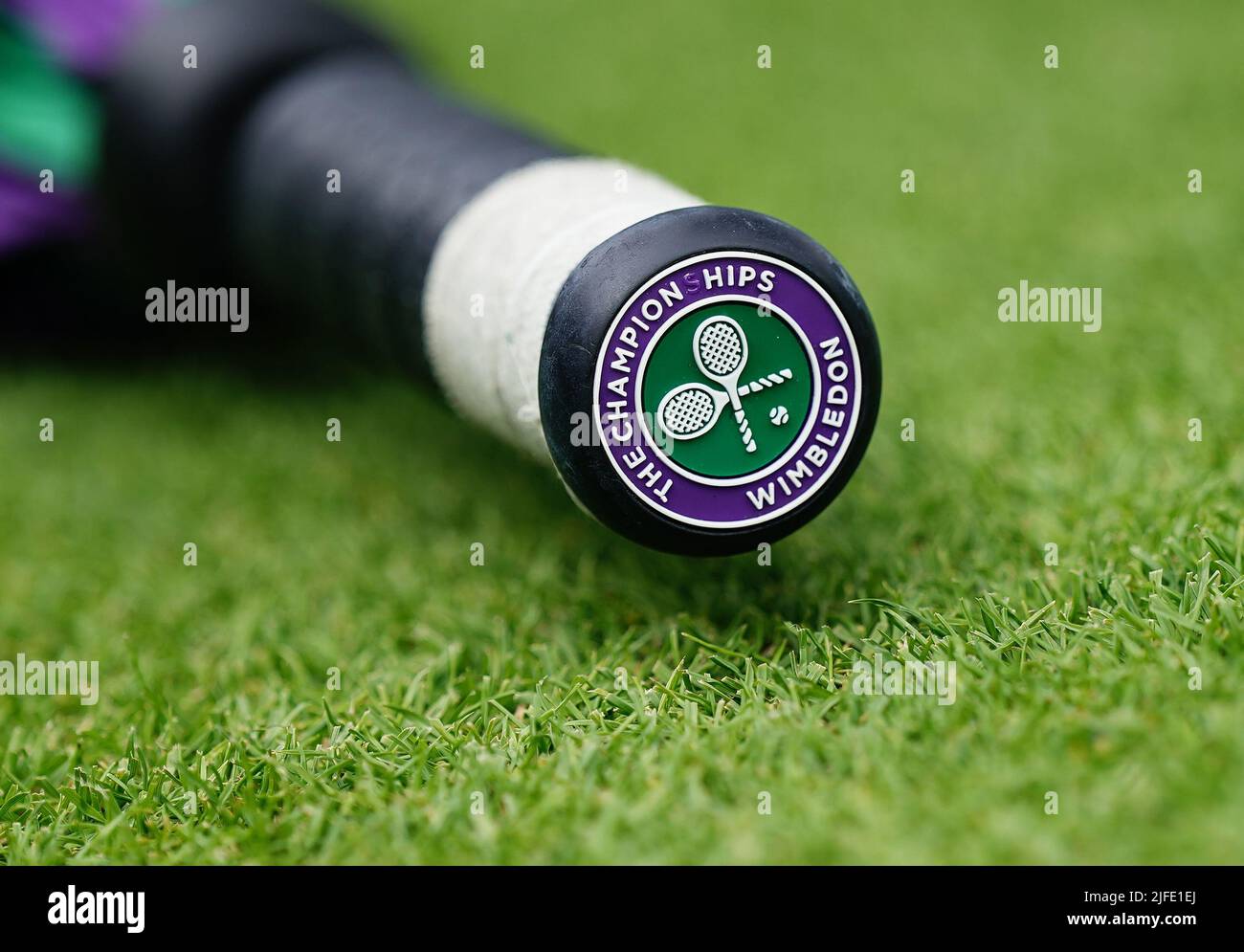 Detail view of a Wimbledon branded umbrella with a missing letter on ...