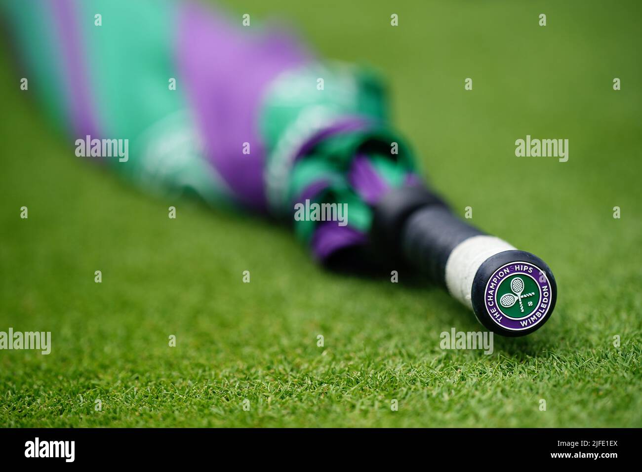 A wimbledon branded umbrella hi-res stock photography and images - Alamy