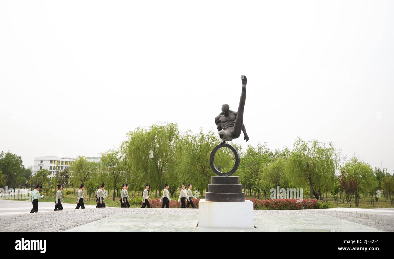 Puyang, China's Henan Province. 26th Apr, 2022. Members of an acrobatic ...