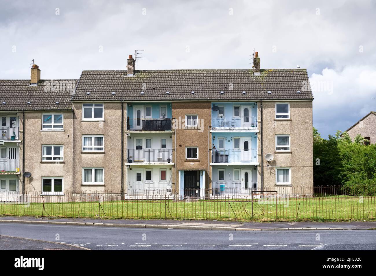 Derelict council house in poor housing estate slum with many social ...