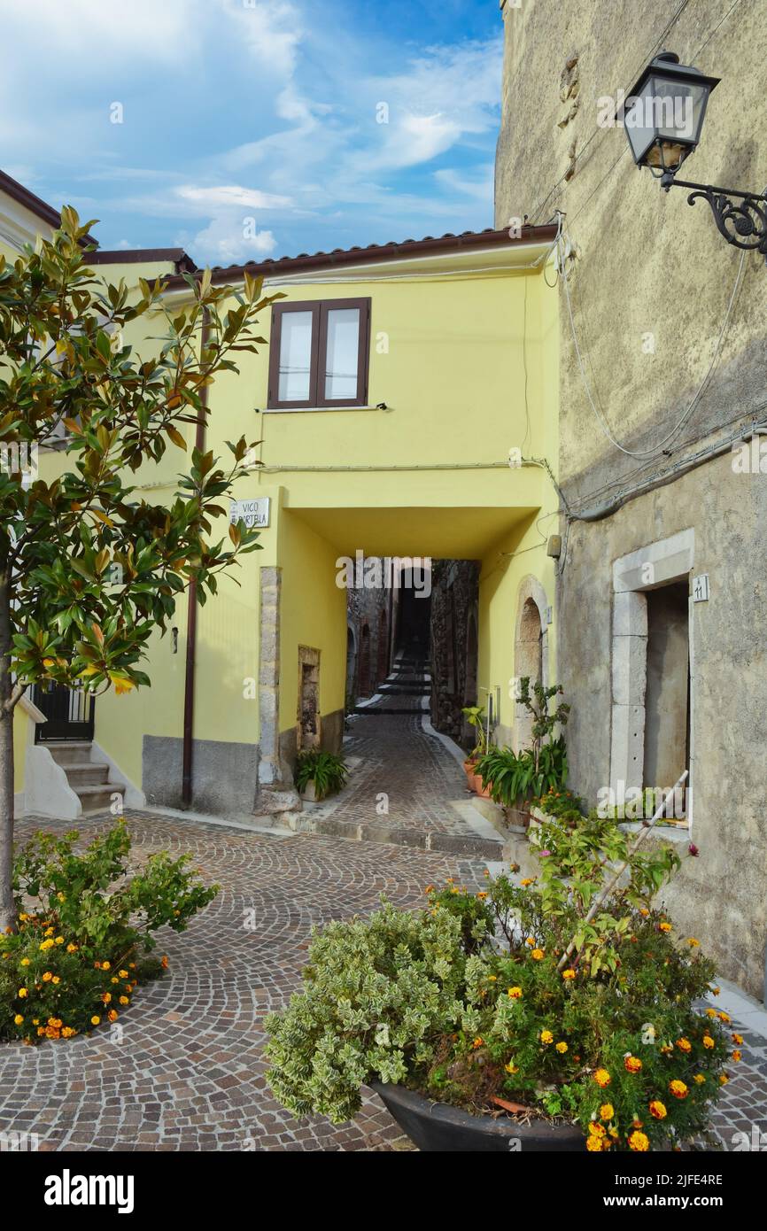 A vertical shot of a narrow street in Fornelli village in the Molise ...