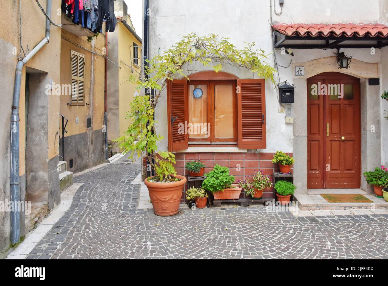 A narrow street in Fornelli village in the Molise region, Italy with ...