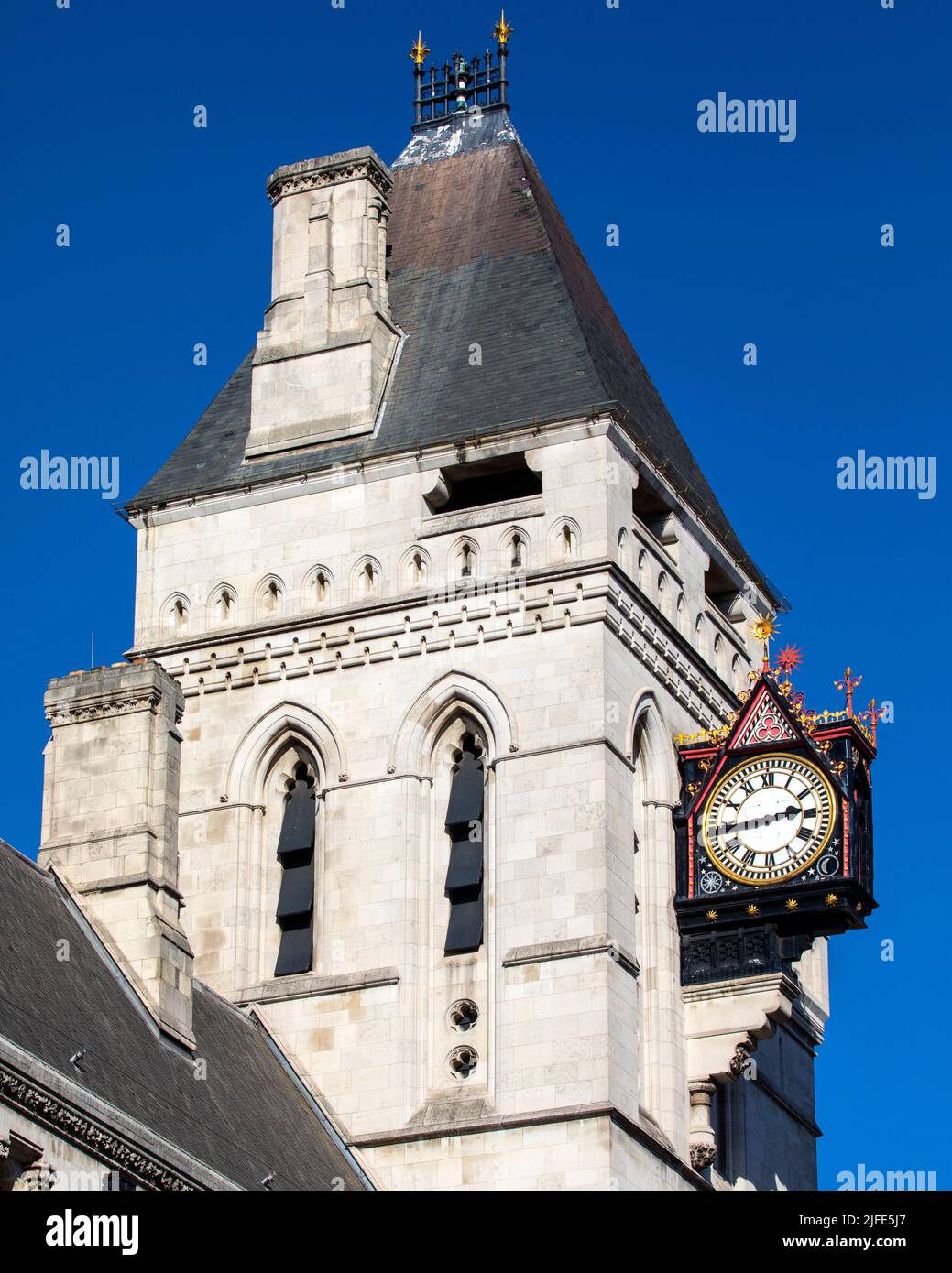 The clocktower of the Royal Courts of Justice building, located on the ...