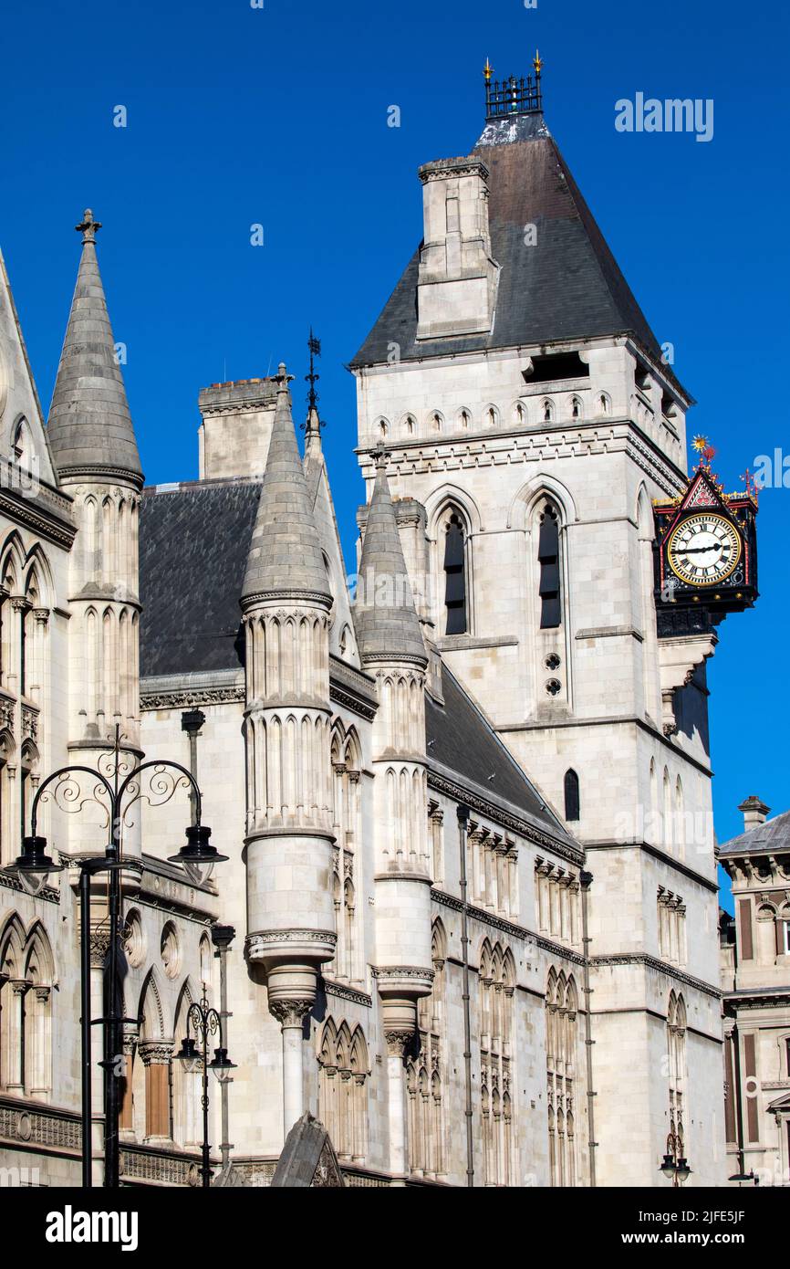 The clocktower of the Royal Courts of Justice building, located on the ...