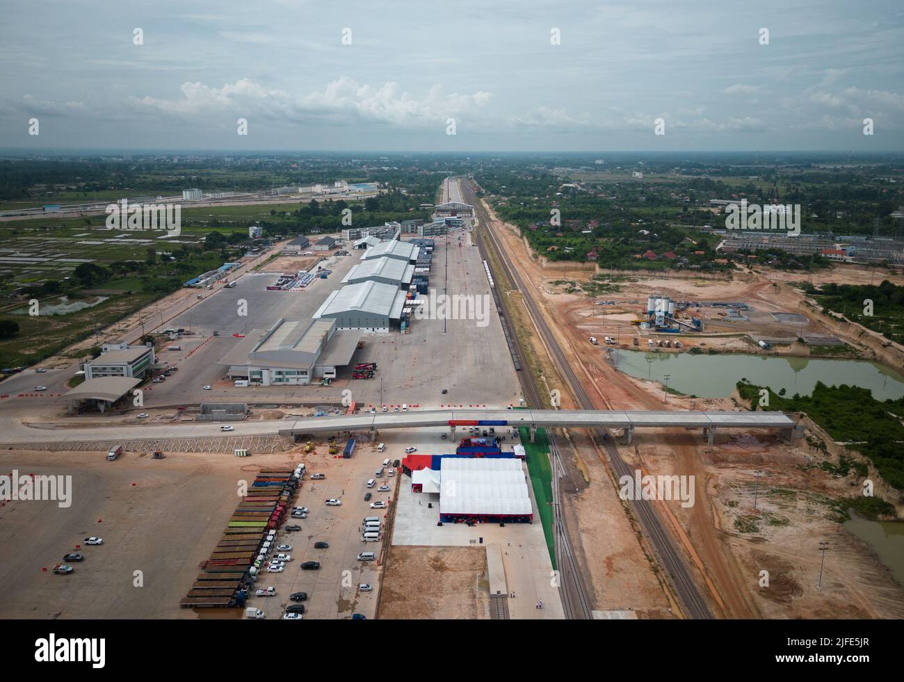 Vientiane. 1st July, 2022. Cross-border goods are reloaded at a freight ...