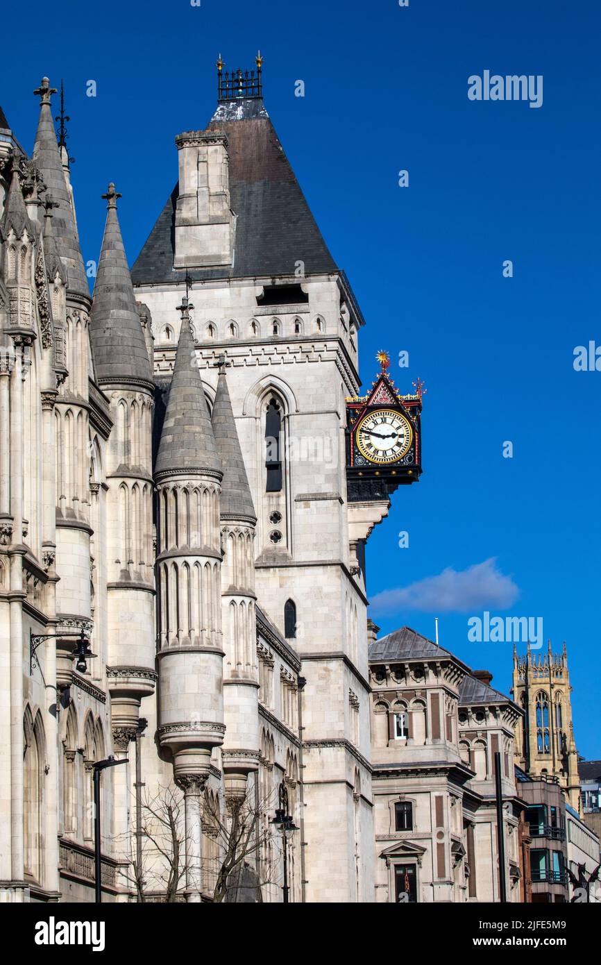 The clocktower of the Royal Courts of Justice building, located on the ...