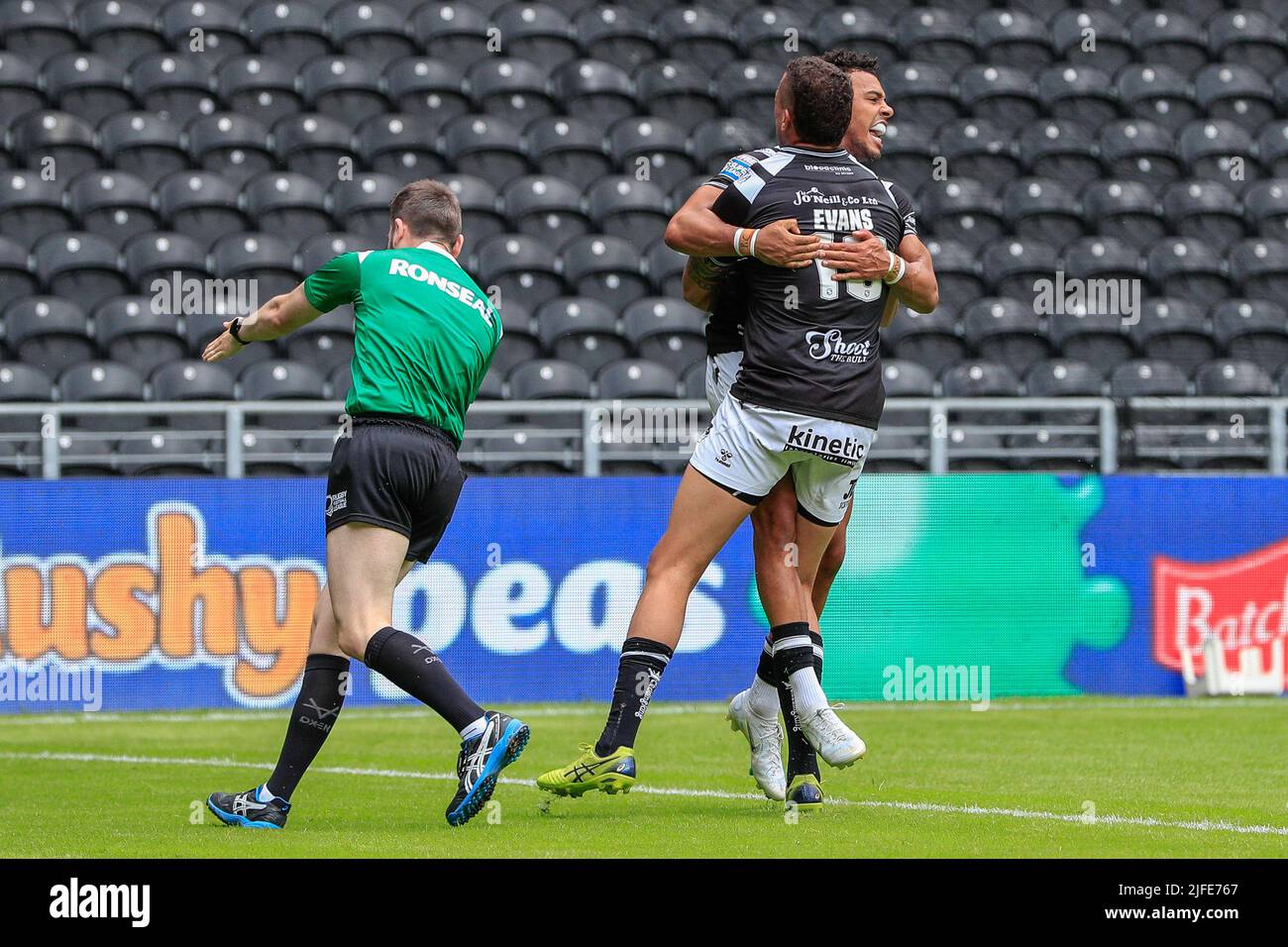 Darnell McIntosh #5 of Hull FC celebrates his try with team mate Kane ...