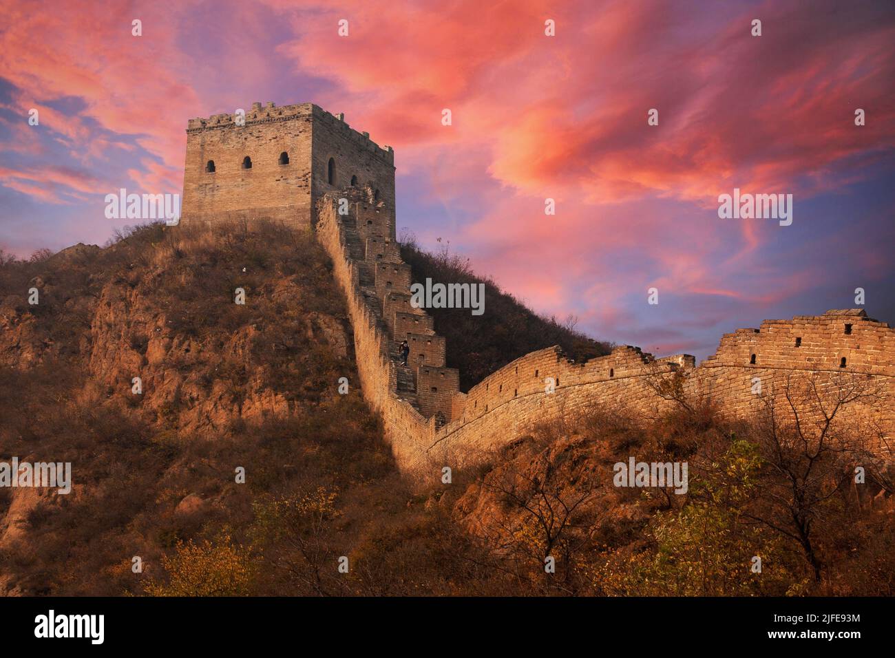 Great wall with watch tower at sunset with dramatic clouds, China Stock ...
