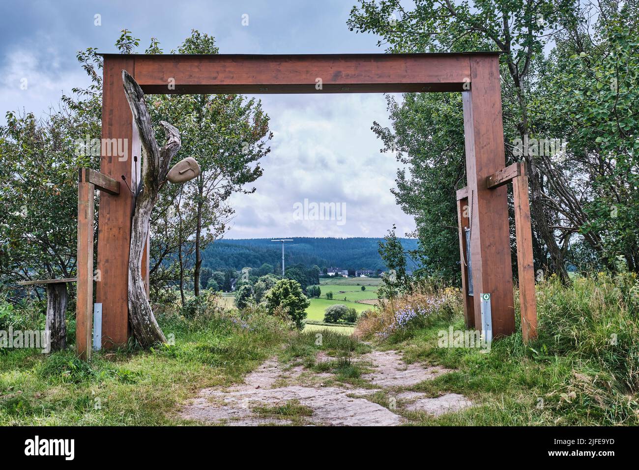 Wooden gate in the forest along Rothaarsteig, Sauerland, a popular ...