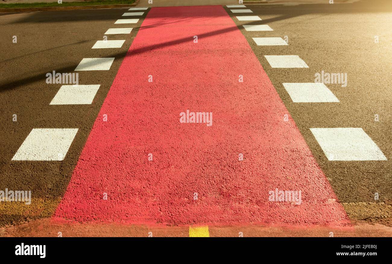 Bike Path With Bicycle Crossing Priority Route For Cyclists Stock bike-path-with-bicycle-crossing-priority-route-for-cyclists-stock