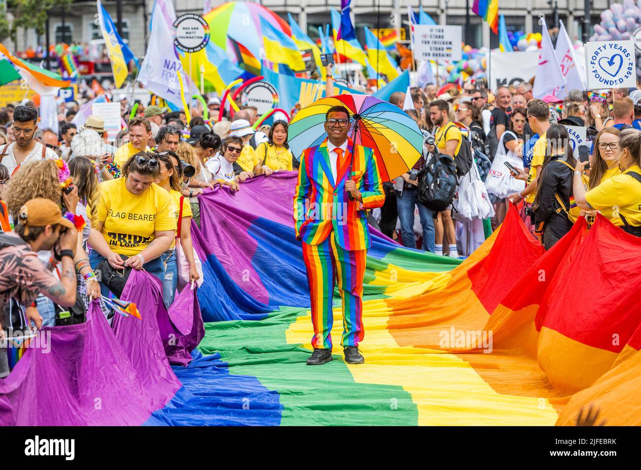 London, UK. 2nd July, 2022. A huge pride flag is laid out ready to be ...