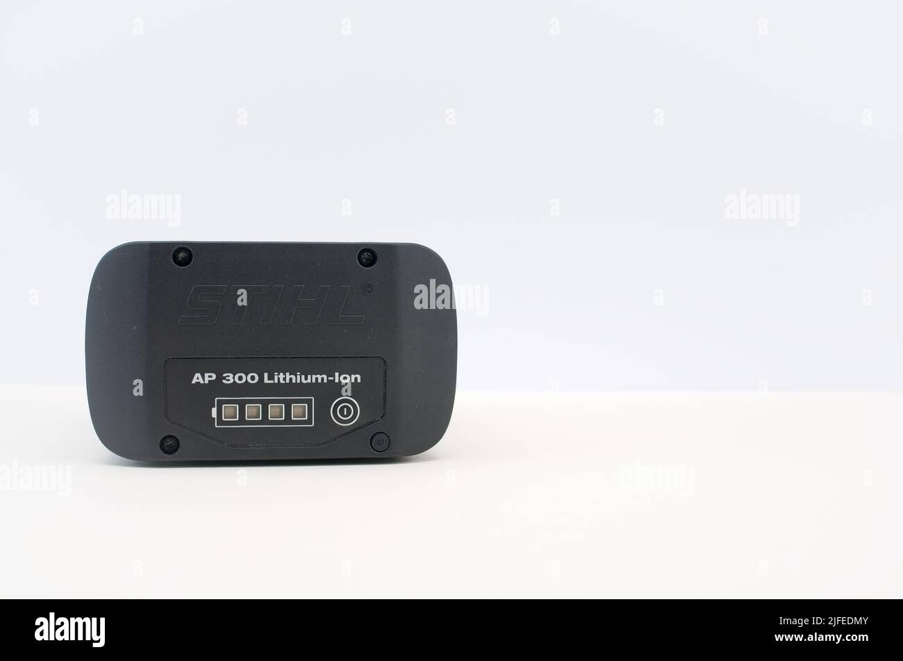 industrial grade high capacity lithium ion battery on a white desk ...