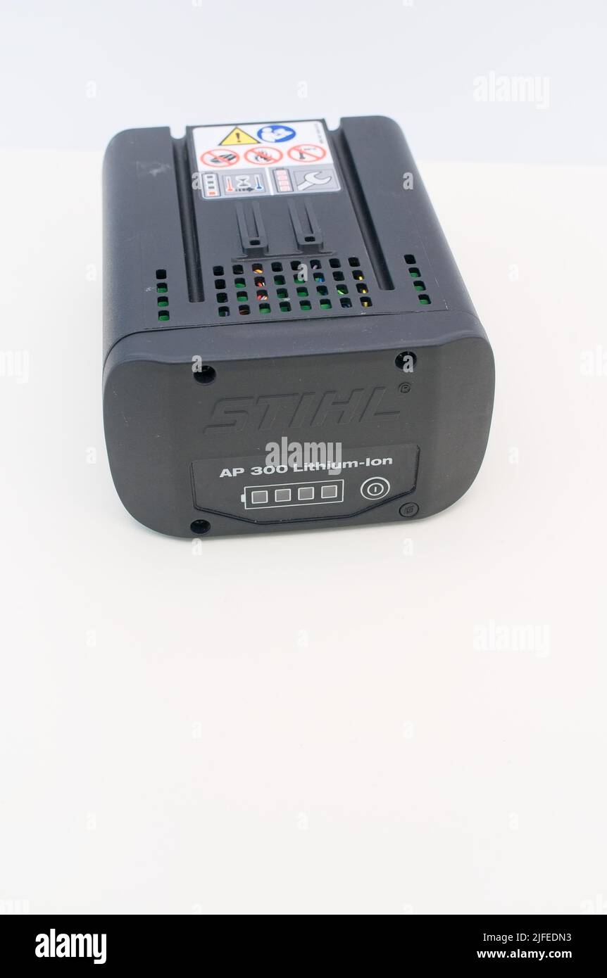 industrial grade high capacity lithium ion battery on a white desk ...