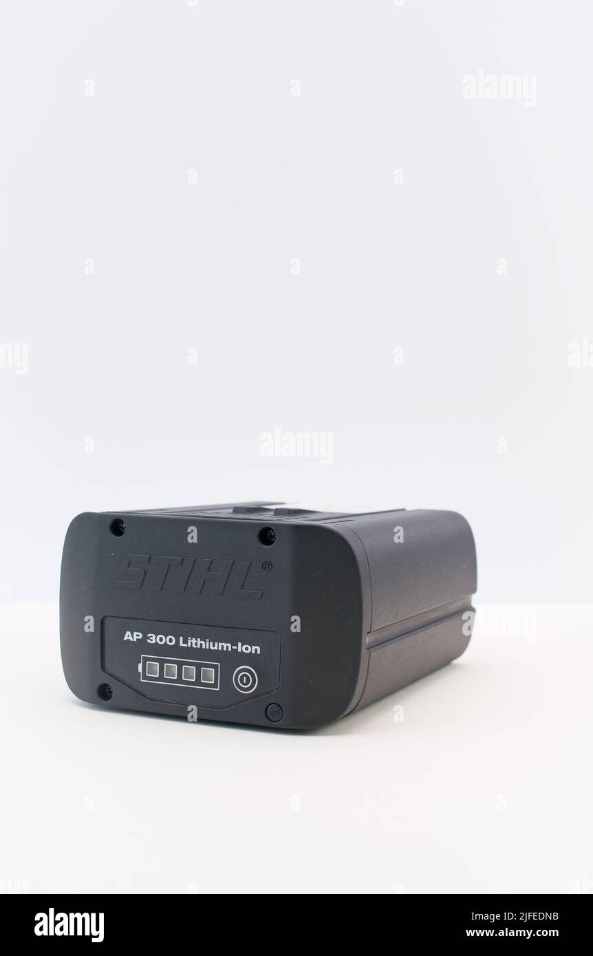 industrial grade high capacity lithium ion battery on a white desk ...