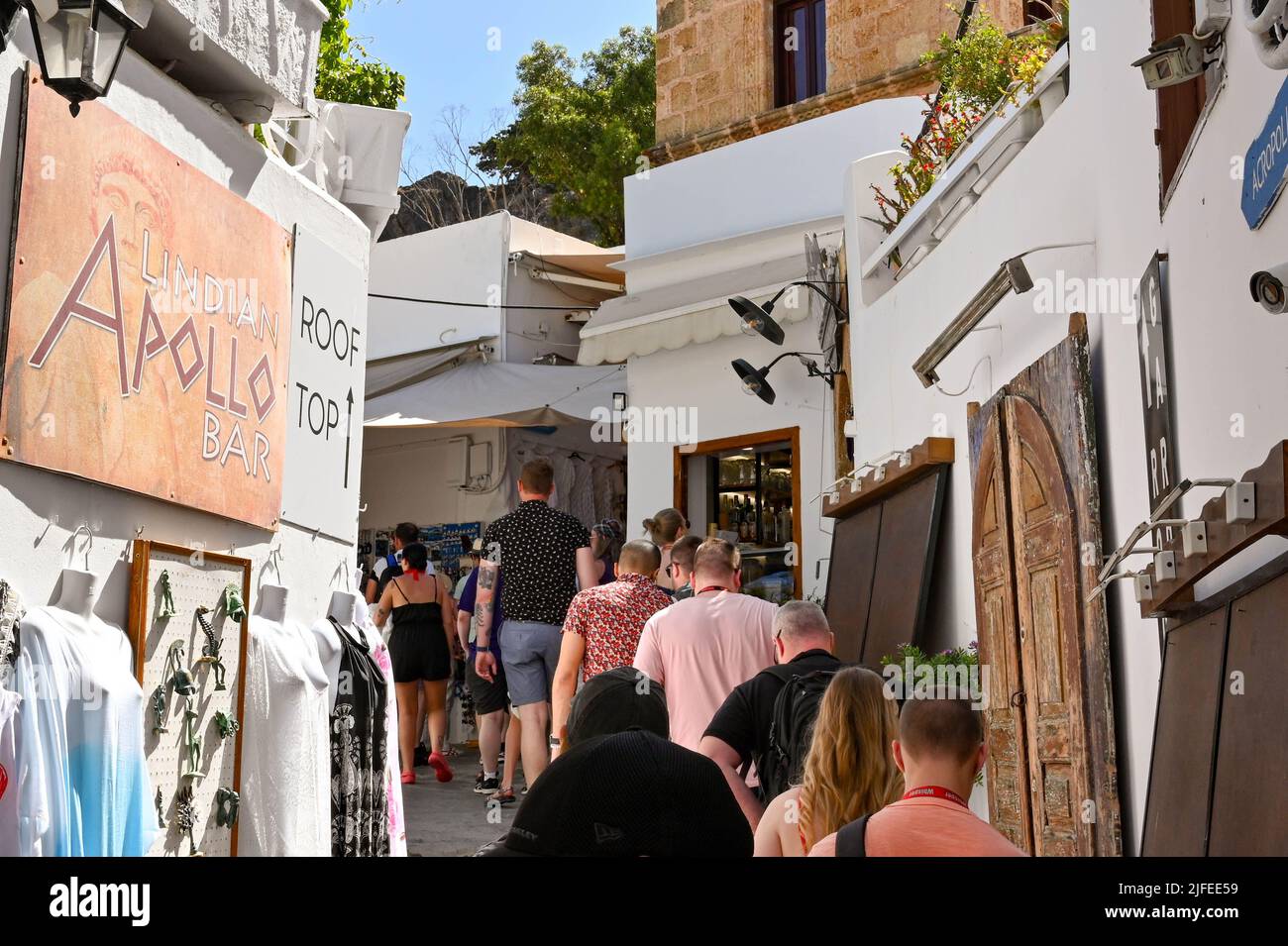 Lindos, Rhodes, Greece - May 2022: Visitors climbing the steps through ...