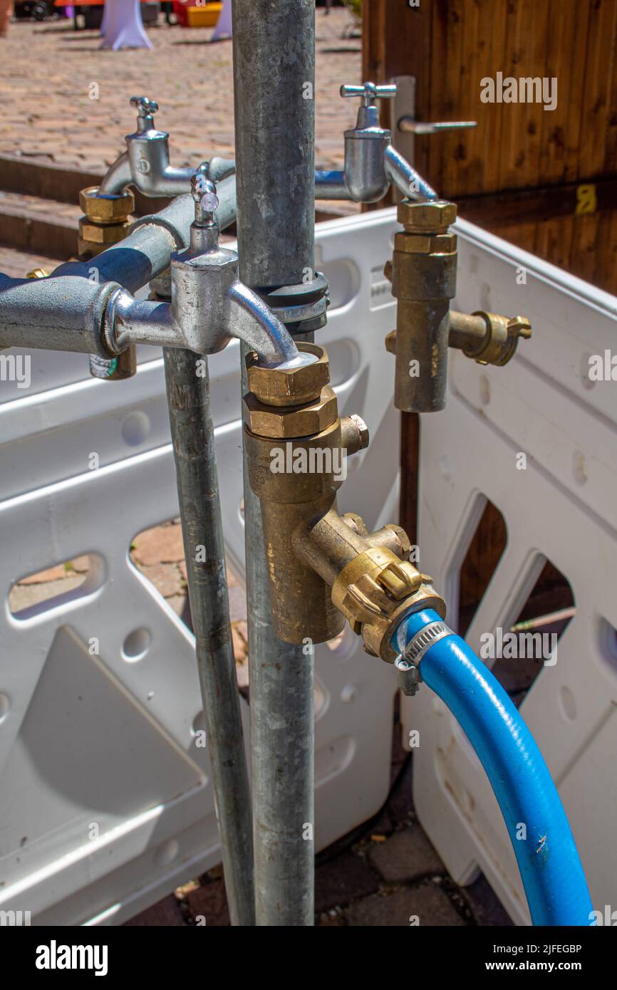 temporary water supply for a street festival in germany with water ...