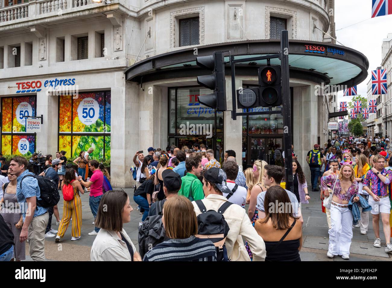 London, UK. 2 July 2022. Large queues outside Tesco (a corporate ...