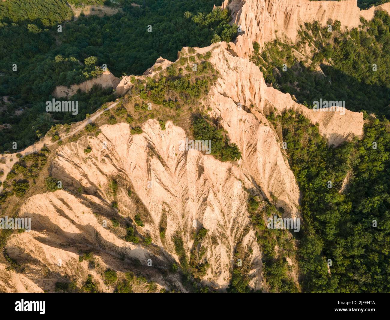 Aerial sunset view of Rozhen sand pyramids, Blagoevgrad region ...