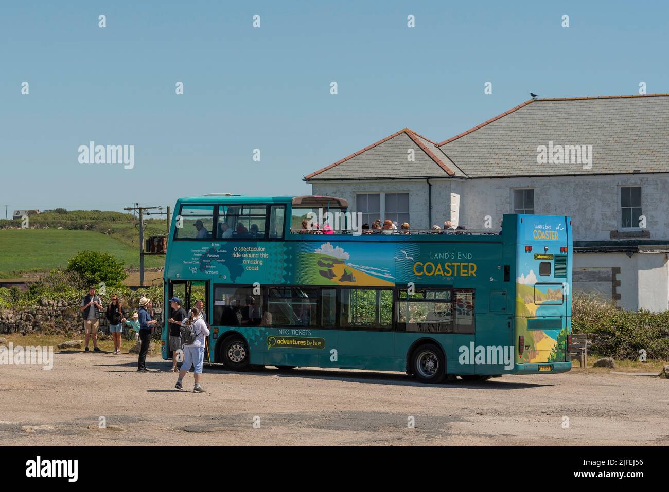 Cornwall, England, UK. 2022. Passengers travelling on a open top ...