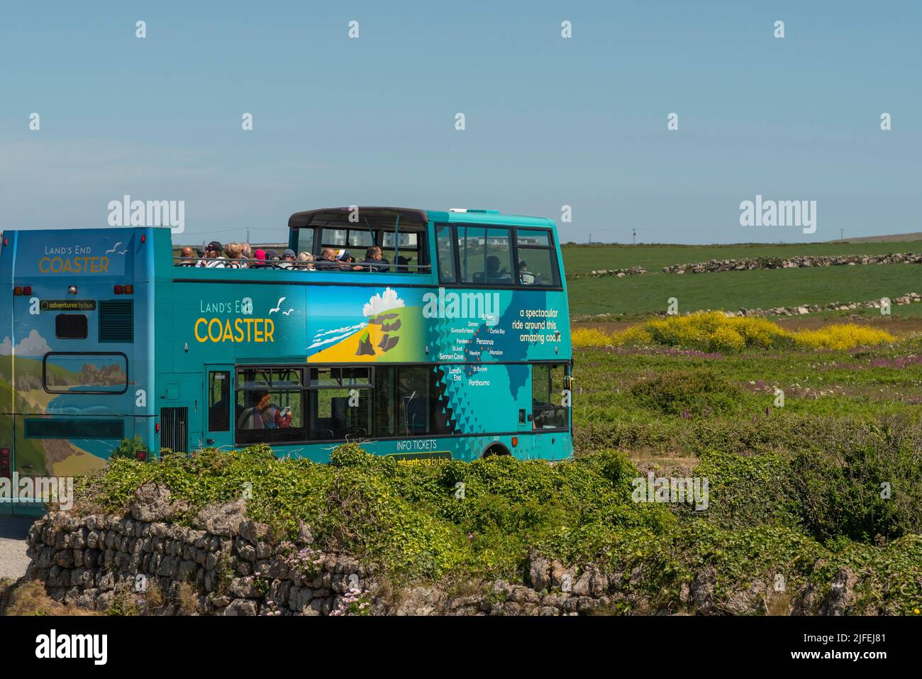 Cornwall, England, UK. 2022. Passengers travelling on a open top ...