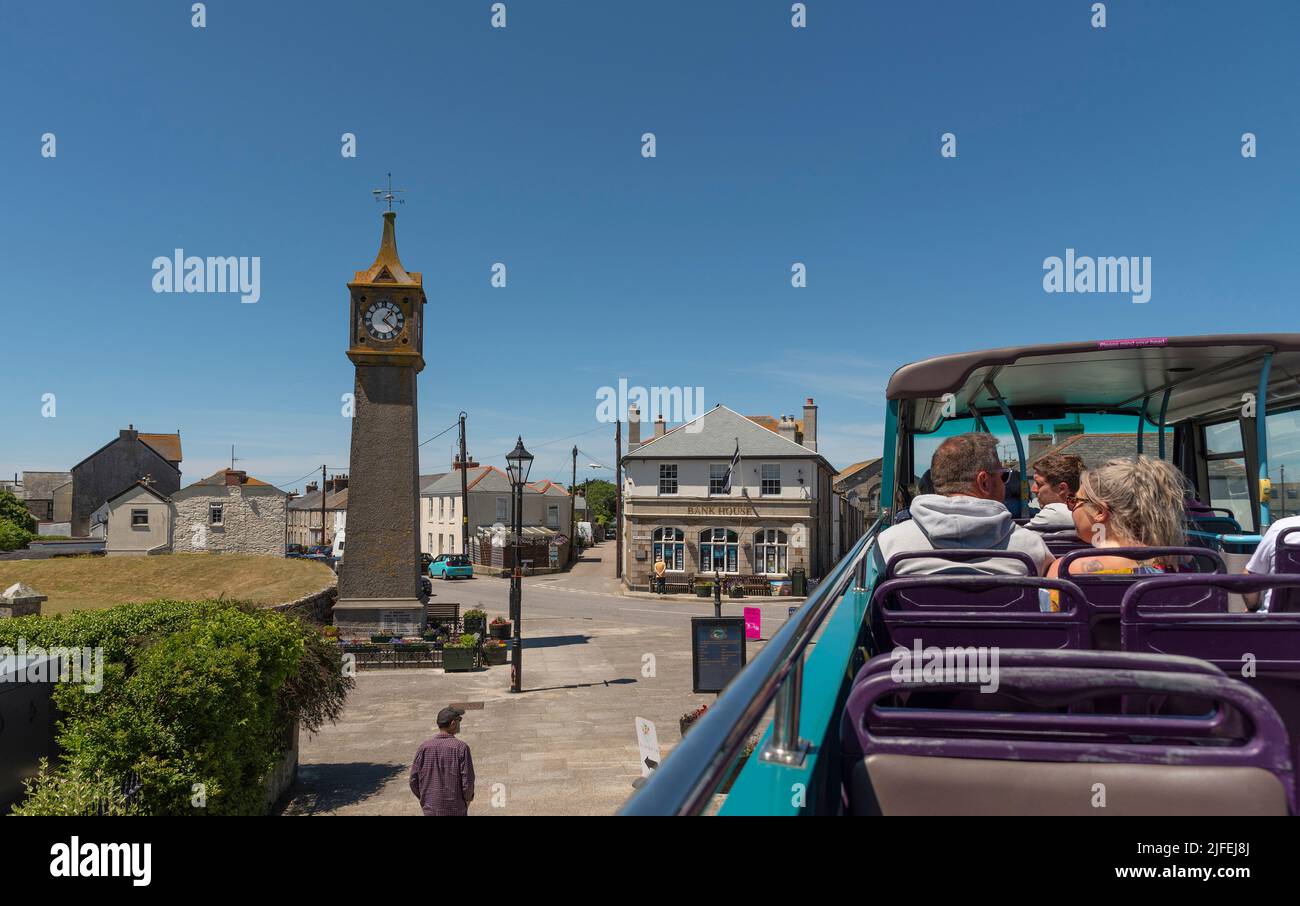 Cornwall, England, UK. 2022. Passengers travelling on a open top ...