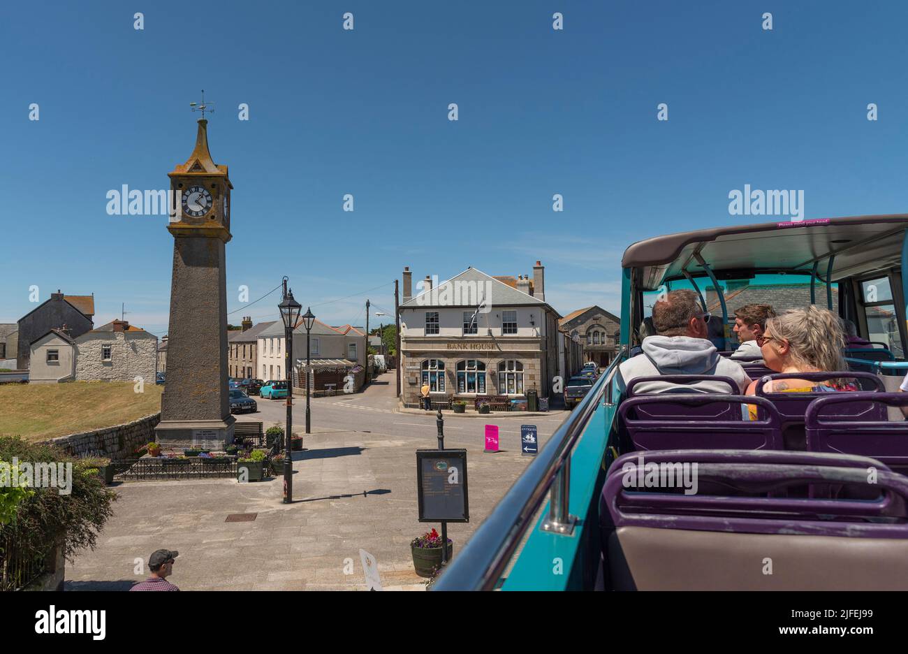 Cornwall, England, UK. 2022. Passengers travelling on a open top ...