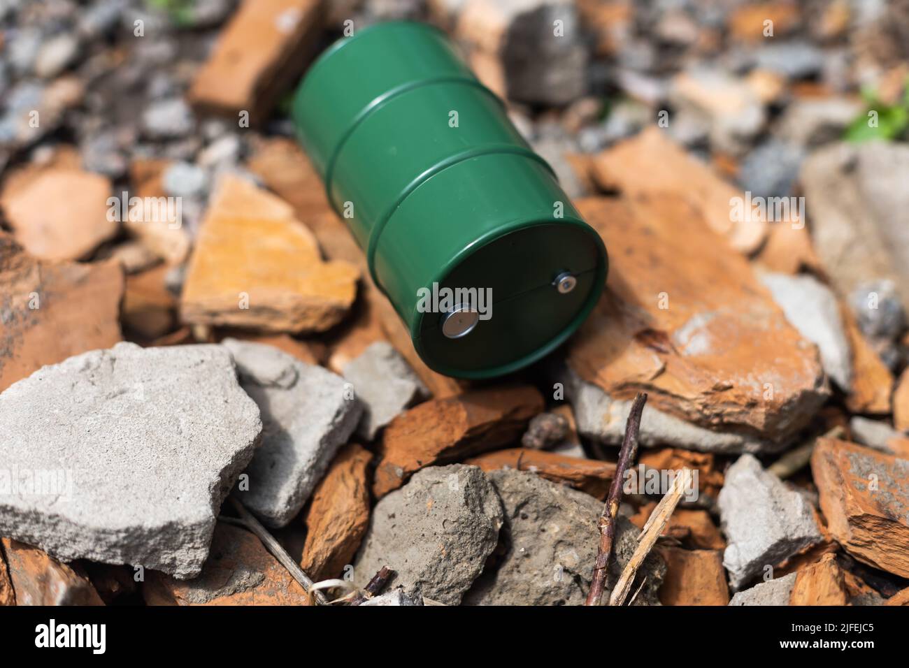 toy oil barrel on a natural background Stock Photo - Alamy