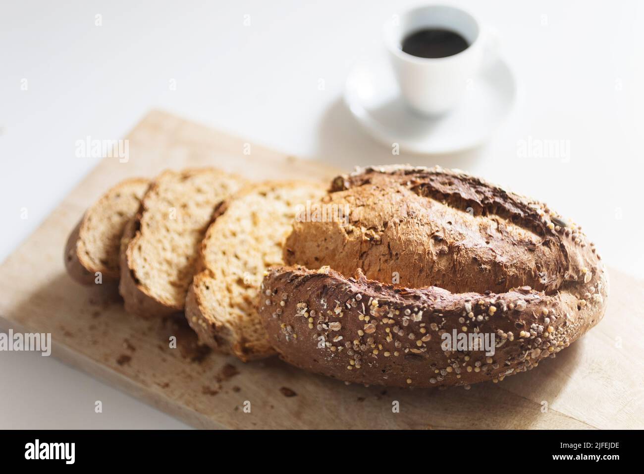 Preparation of breakfast, sliced wholemeal bread Stock Photo - Alamy