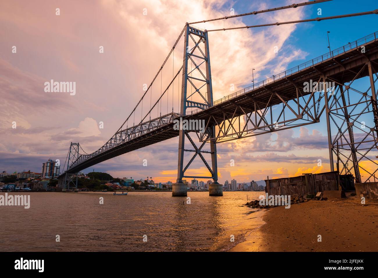 Hercilio luz cable stayed bridge with sunset sky in Florianopolis ...