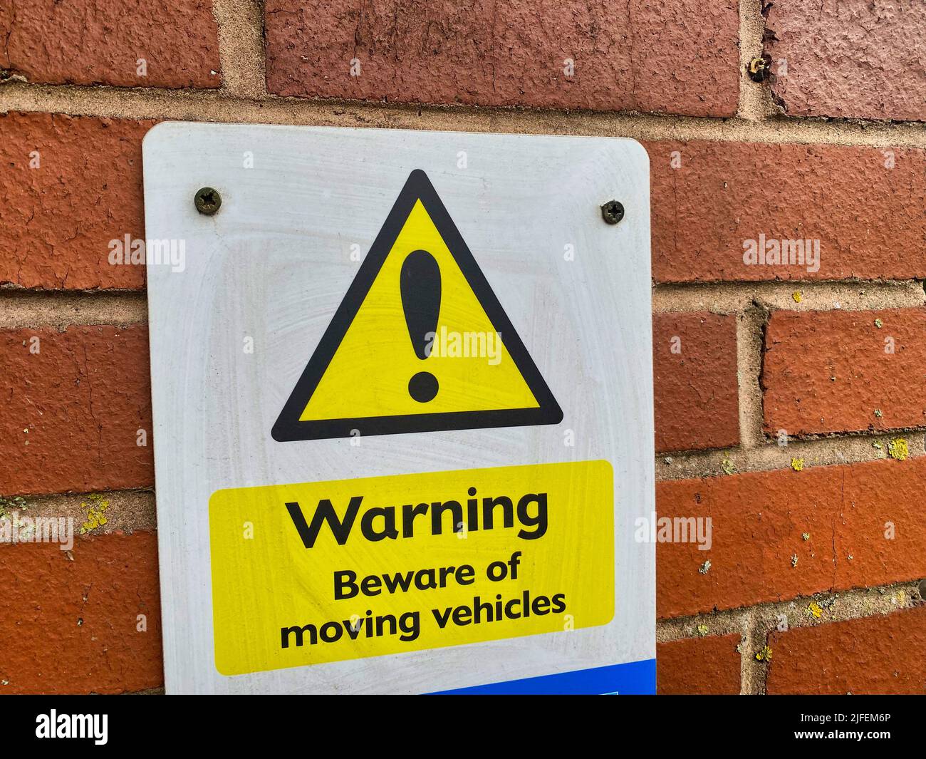 Warning sign for moving vehicles Stock Photo - Alamy