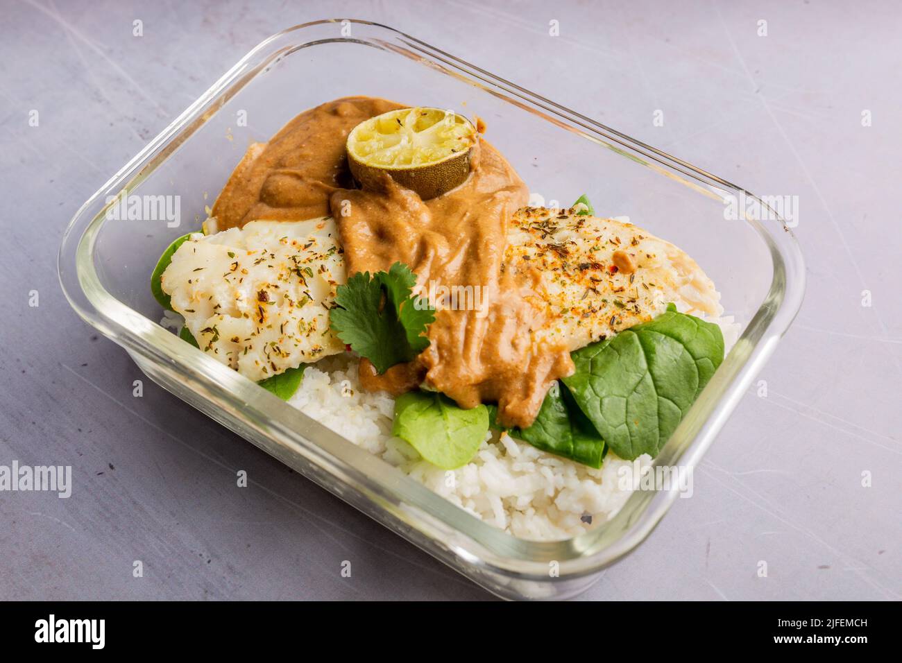 A freshly cooked fried rice with vegetables and fruit toppings on a ...