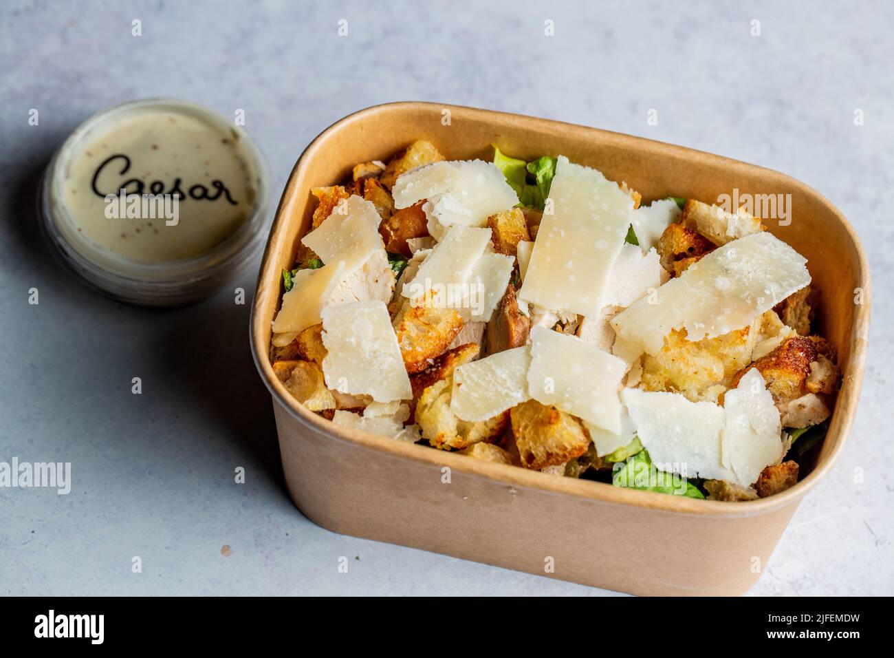 A freshly cooked fried rice with vegetables and fruit toppings on a ...