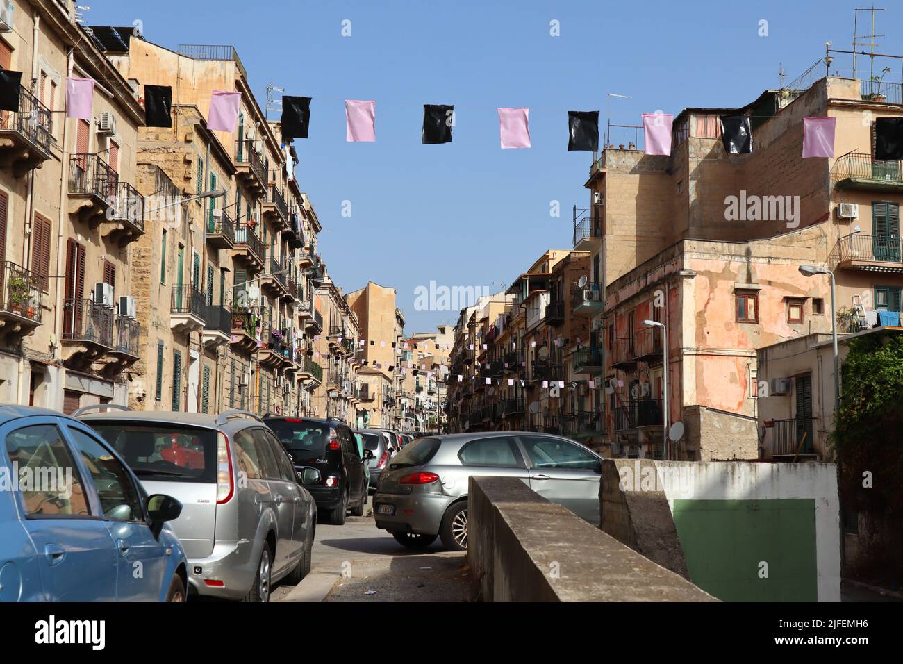 Palermo, Sicily (Italy): scenery of a street of Palermo with flags ...