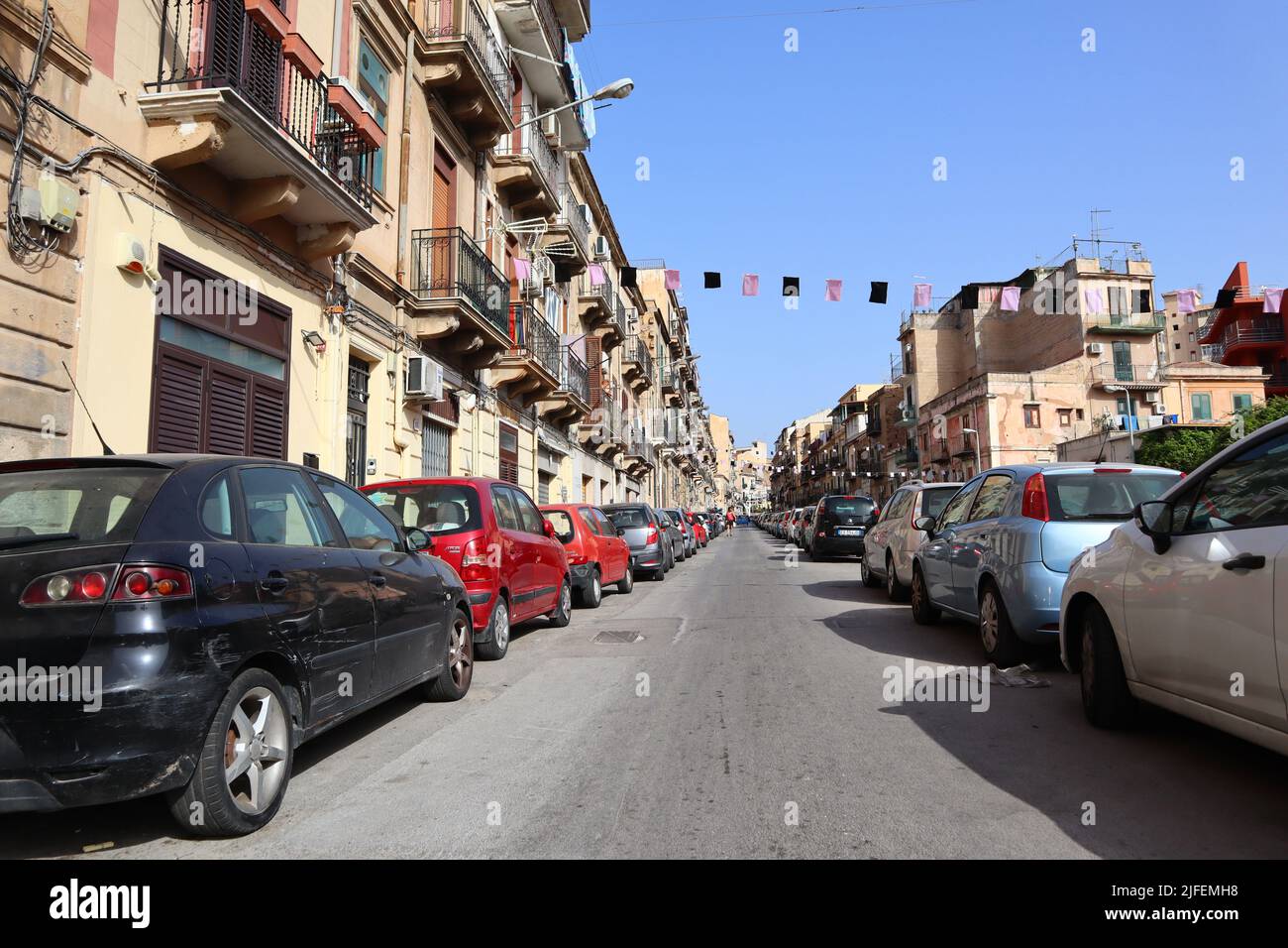 Palermo, Sicily (Italy): scenery of a street of Palermo with flags ...
