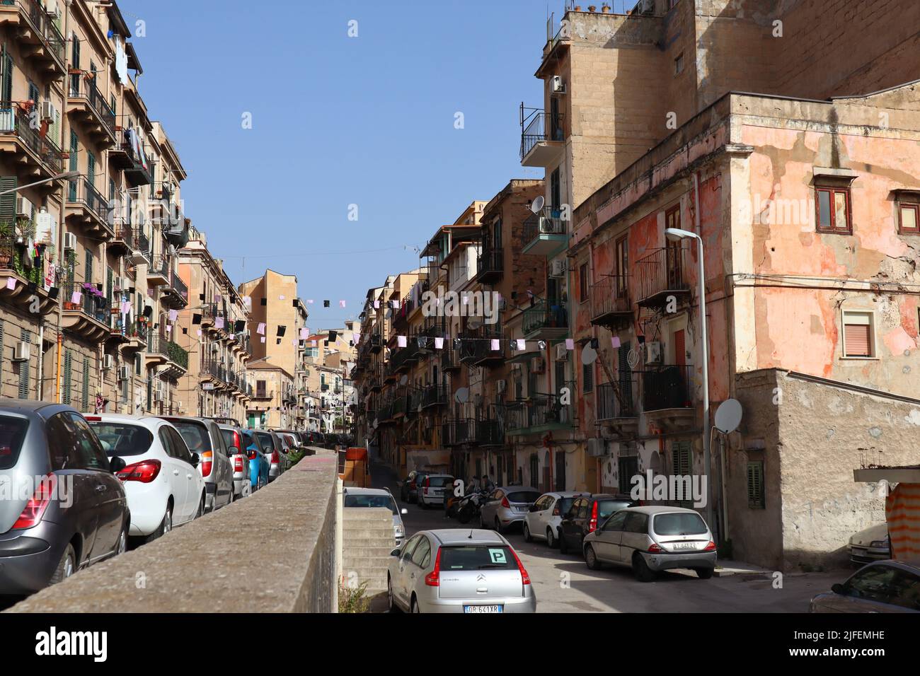 Palermo, Sicily (Italy): scenery of a street of Palermo with flags ...