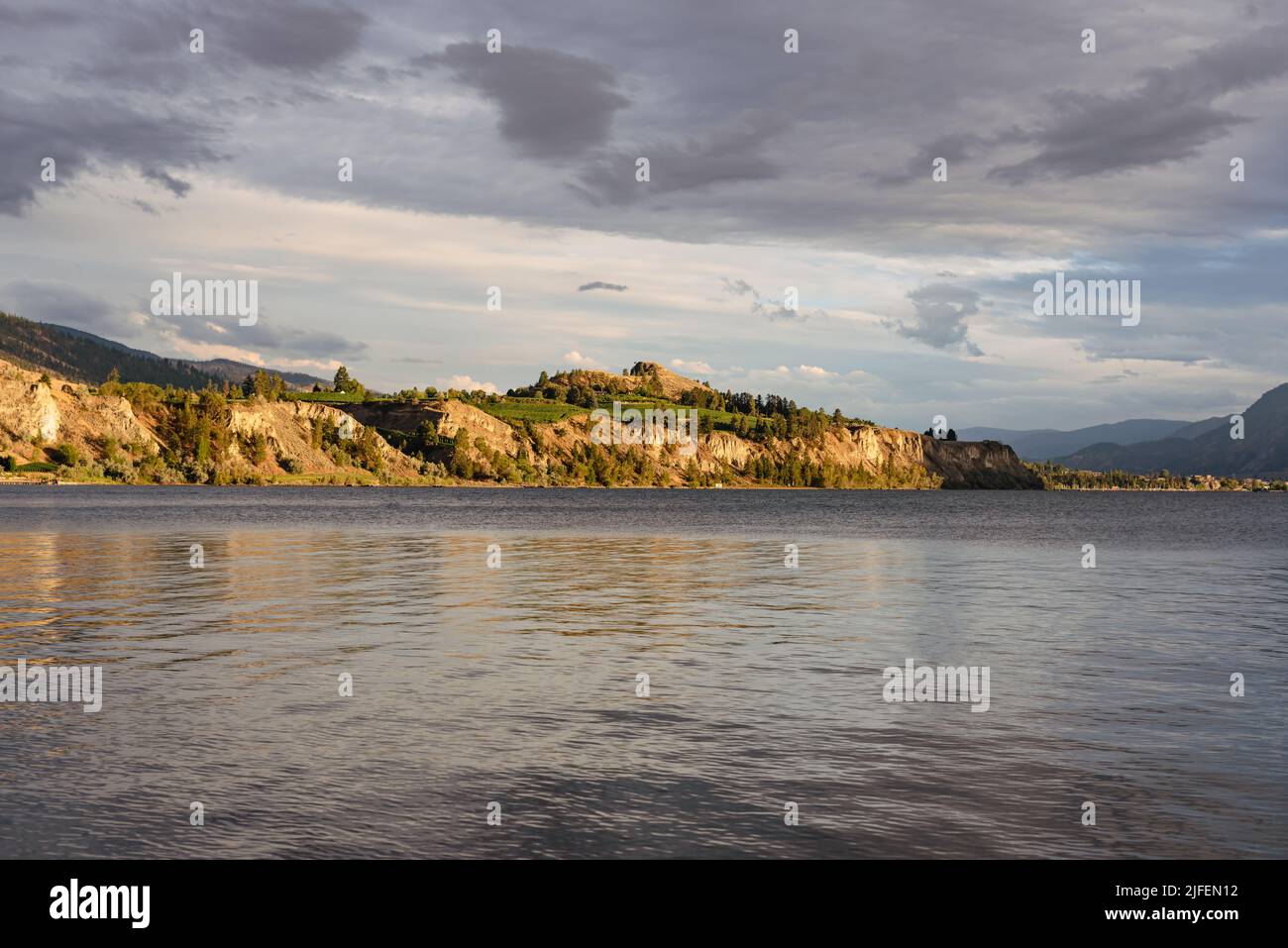 View of Okanagan Lake and Munson Mountain at sunset from Three Mile ...