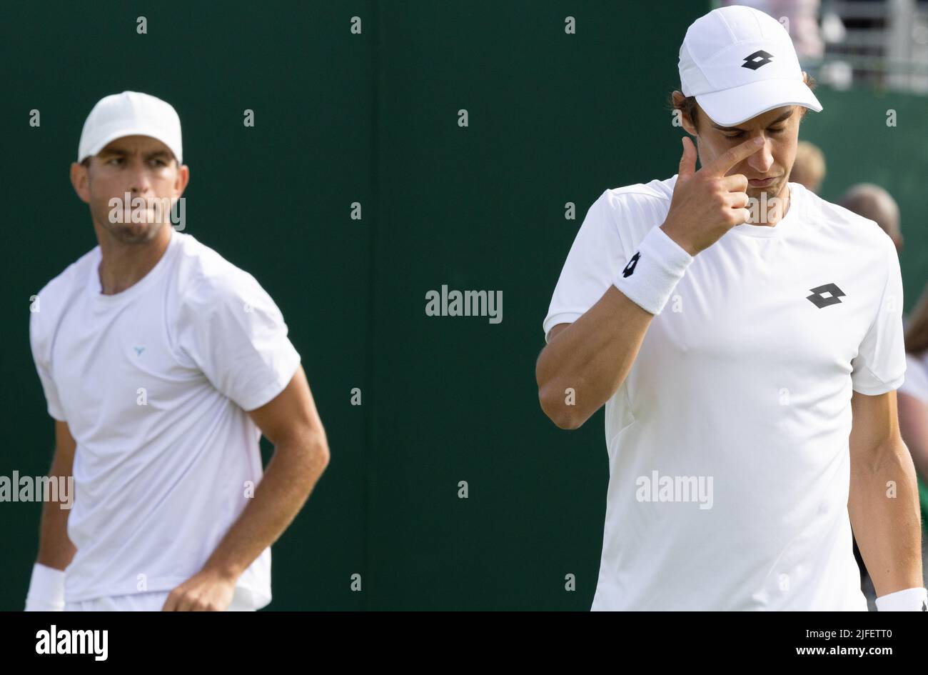 Belgian Joran Vliegen (R) and US Jackson Withrow look dejected during a ...