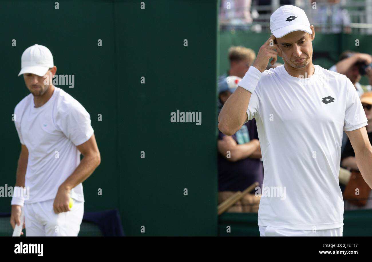 Belgian Joran Vliegen (R) and US Jackson Withrow look dejected during a ...
