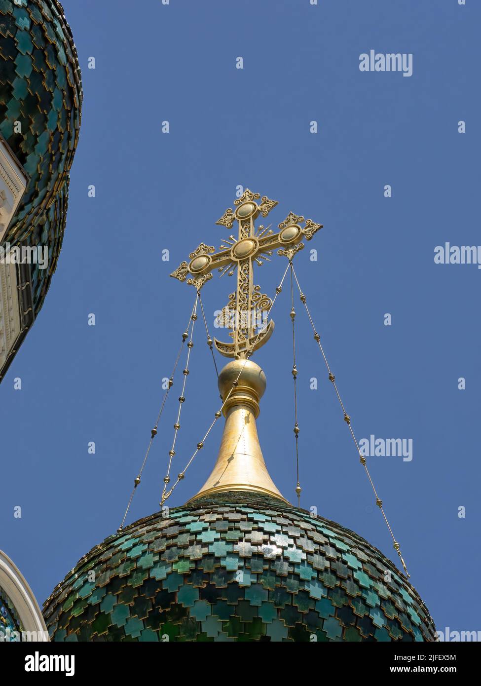 NICE, FRANCE - MAY 29, 2018: Gilded cross on the main dome of St ...