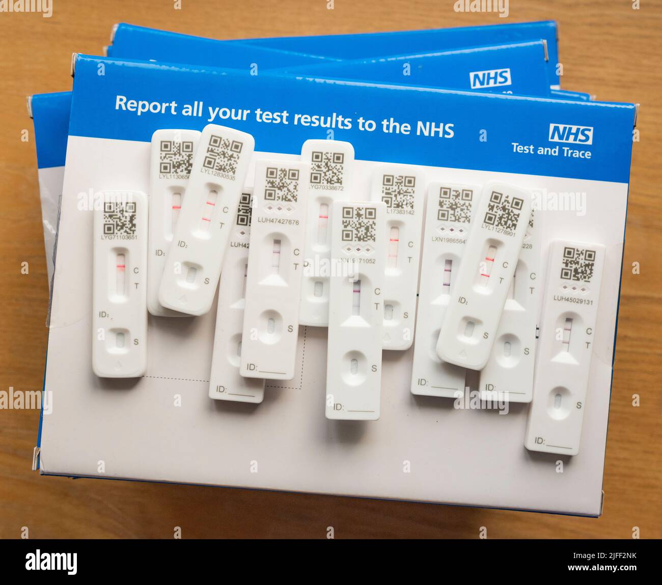 An array of Covid lateral flow tests showing positive results Stock ...