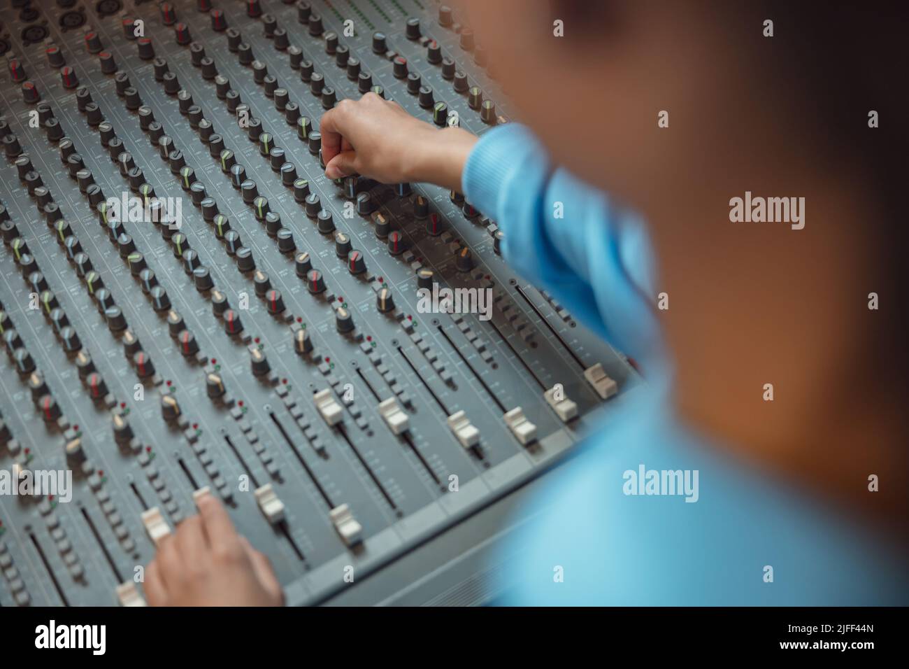 Overhead view of unrecognizable musician, composer, audio engineer ...