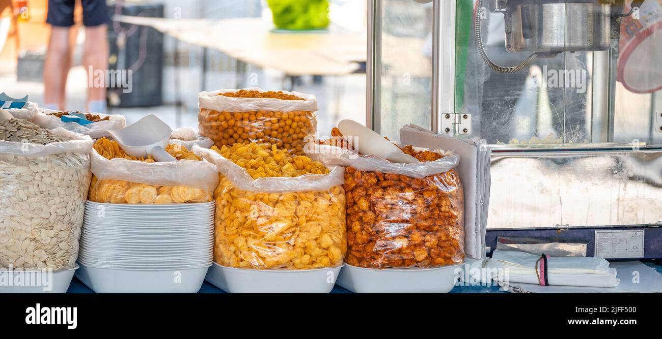 A part of street market with plastic bags filled with Sicilian food ...