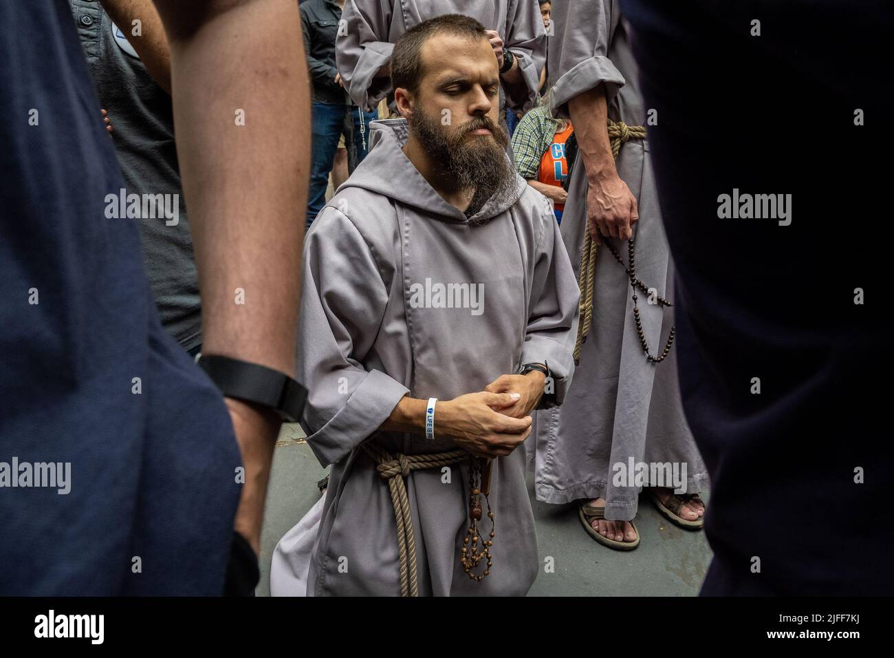 A monk prays during a pro -choice protest outside Old St. Pat's ...