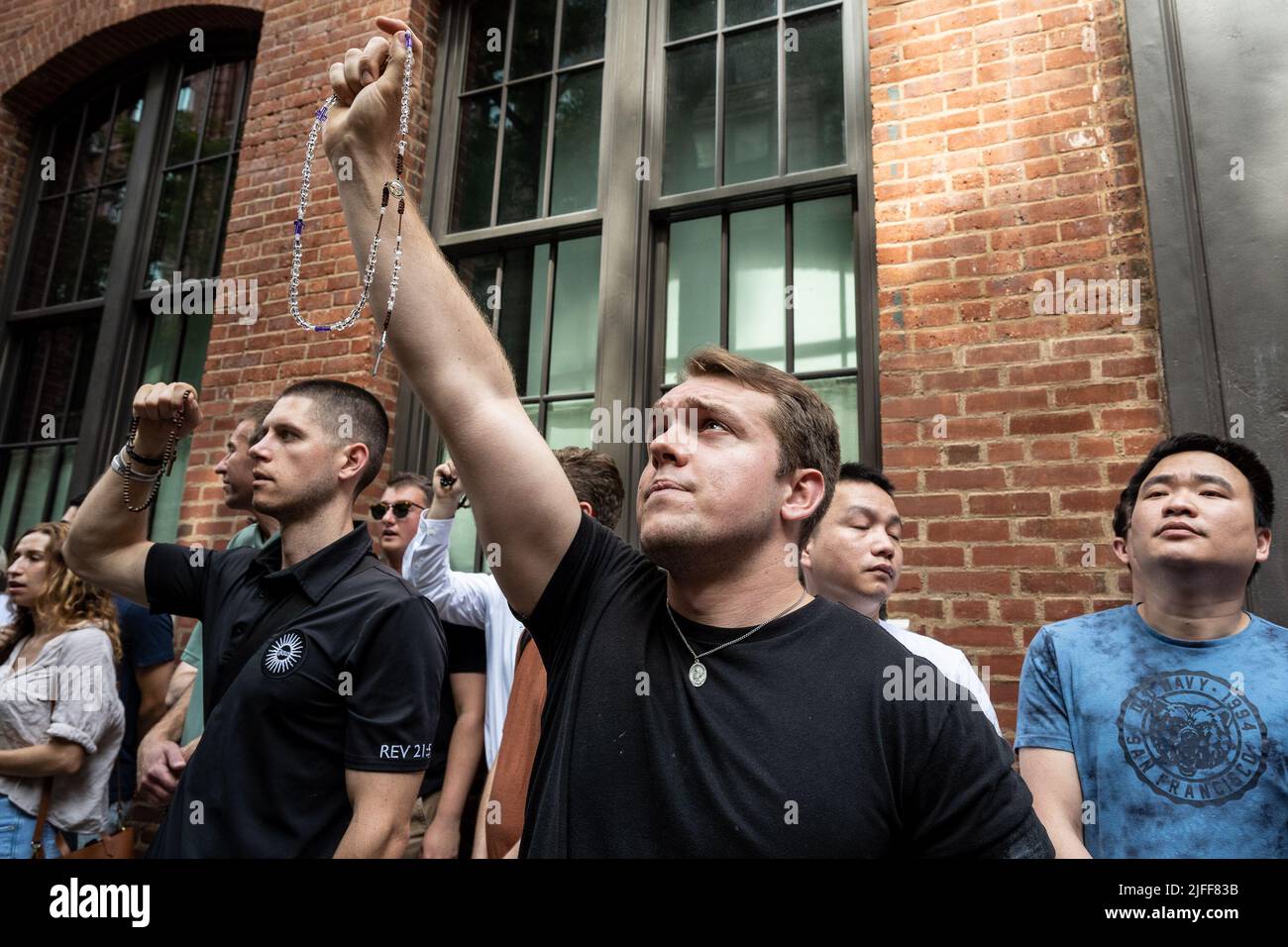 Pro-life supporters pray the rosary outside Planned Parenthood on July ...