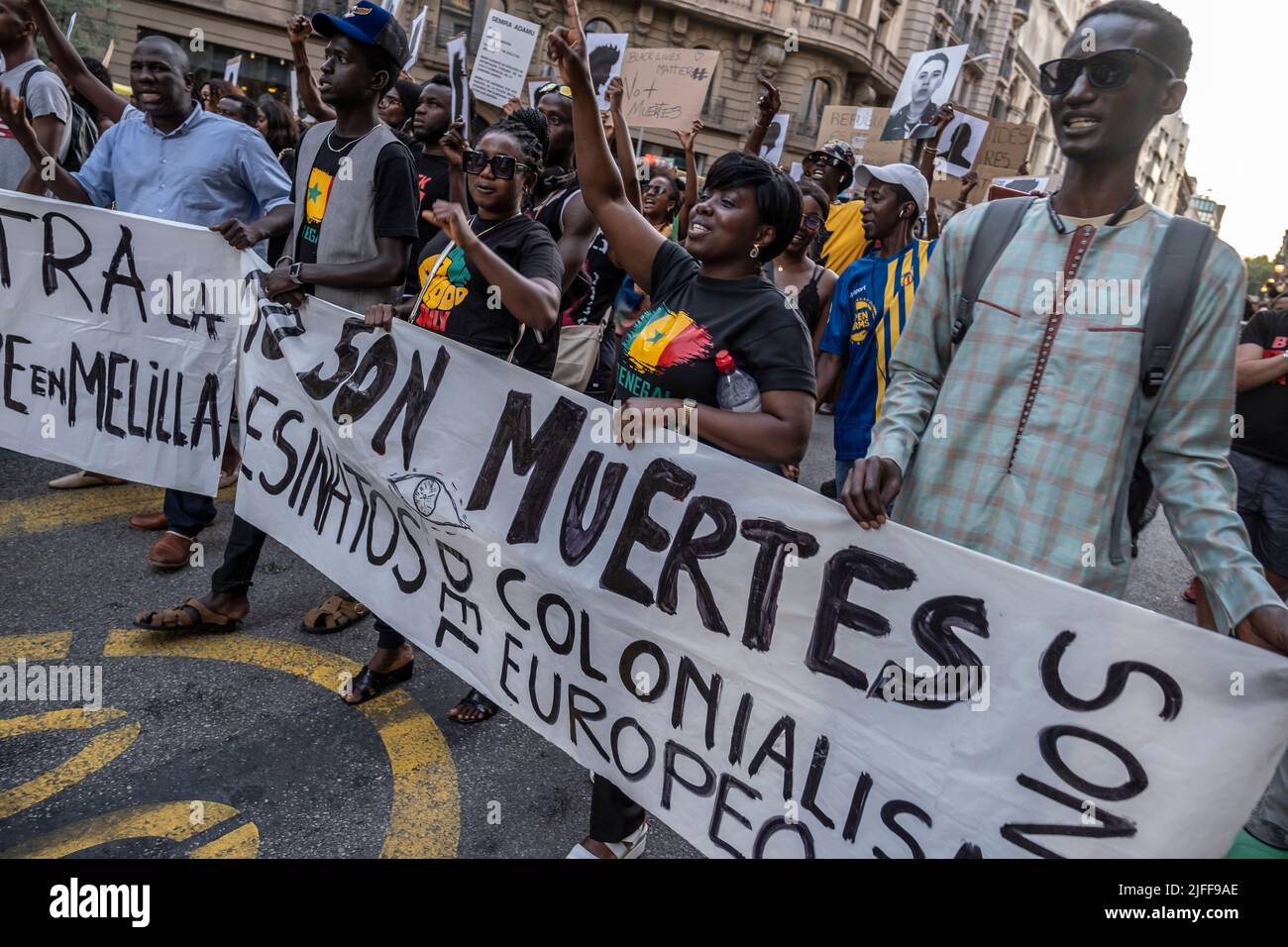 Protesters hold a banner expressing their opinion during the ...
